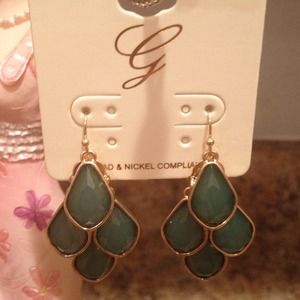50% off Jewelry - Emerald green colored glass drop earrings. from Cathi ...