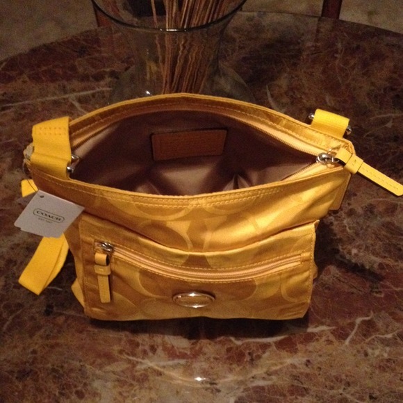 Coach | Bags | 8 Coach Getaway Signature Nylon File Bag | Poshmark