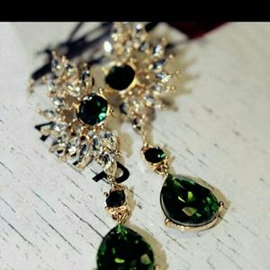 50% off Jewelry - Emerald green colored glass drop earrings. from Cathi ...
