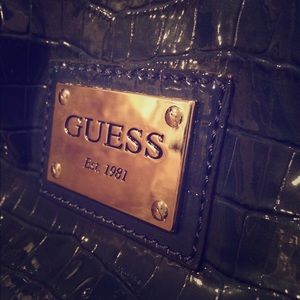 guess est 1981 handbags on Poshmark