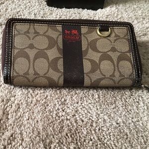 77% off Coach Handbags - Authentic Coach Logo Wallet from Kasey's ...
