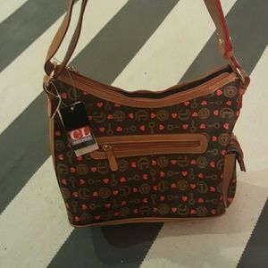CL America Handbags on Poshmark