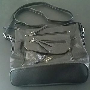 CL America Handbags on Poshmark