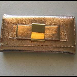 53% off Ivanka Trump Handbags - Blue Wallet with charger by Ivanka from ...