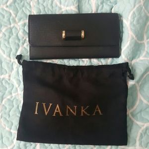 53% off Ivanka Trump Handbags - Blue Wallet with charger by Ivanka from ...