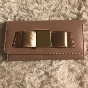53% off Ivanka Trump Handbags - Blue Wallet with charger by Ivanka from ...