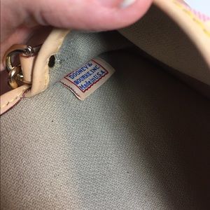 Dooney & Bourke | Bags | Dooney Bourke Logo Flap Wristlet | Poshmark